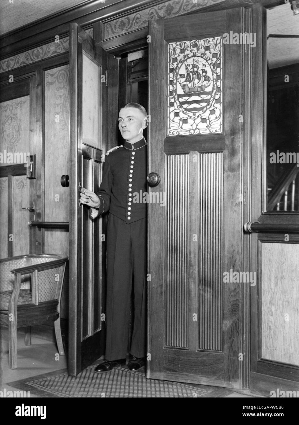 MS Colombia Lift operator in a lift doors on the passenger ship ...