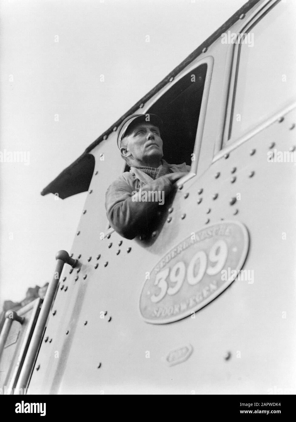 Reportage Nederlandse Railways Engineer looks out the side window of a ...