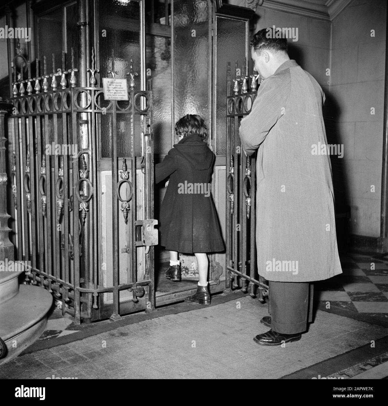 Residents of an apartment building in Paris Man and a girl while ...