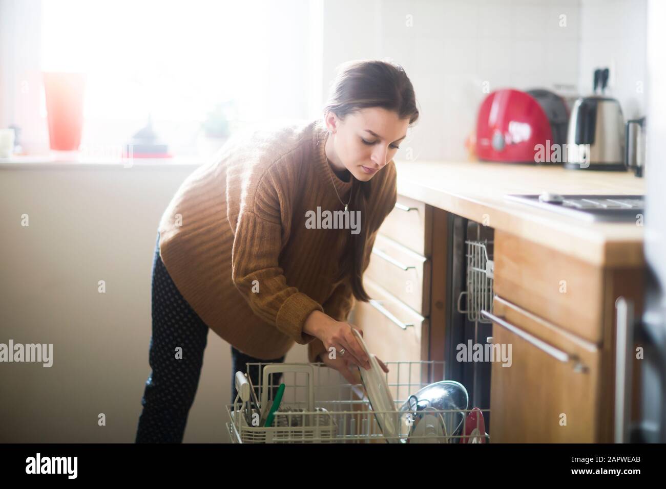 Woman work kitchen hi-res stock photography and images - Alamy