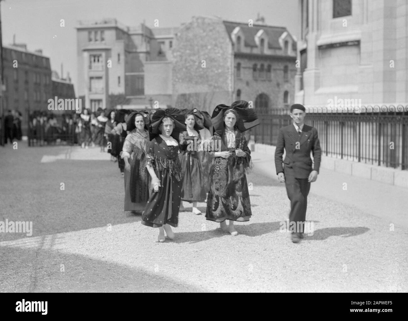 World Exhibition Paris 1937 Man with a group of ladies in costume Date ...