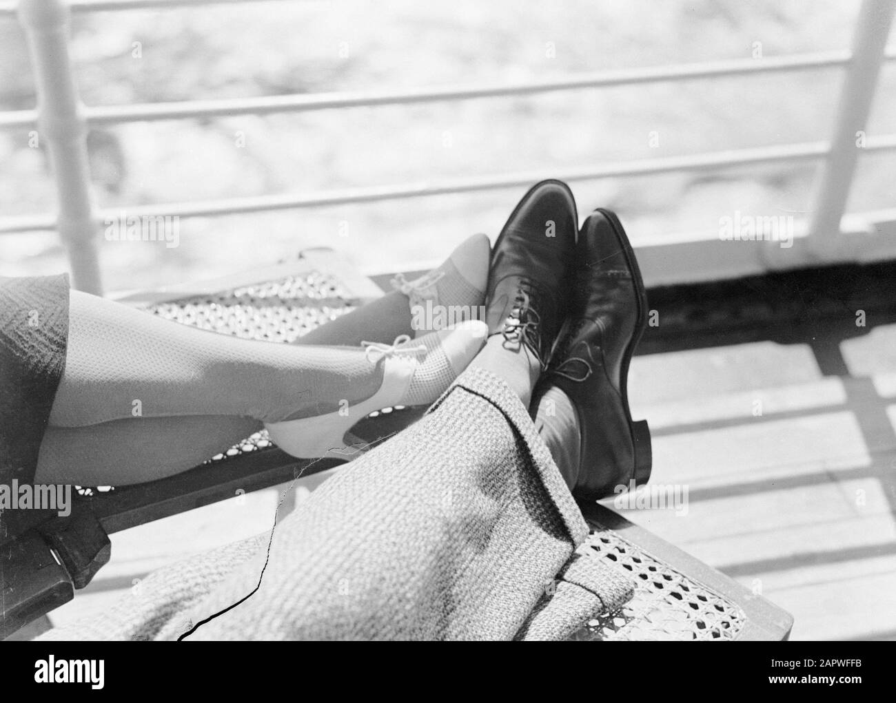 Feet on ship deck Black and White Stock Photos & Images - Alamy