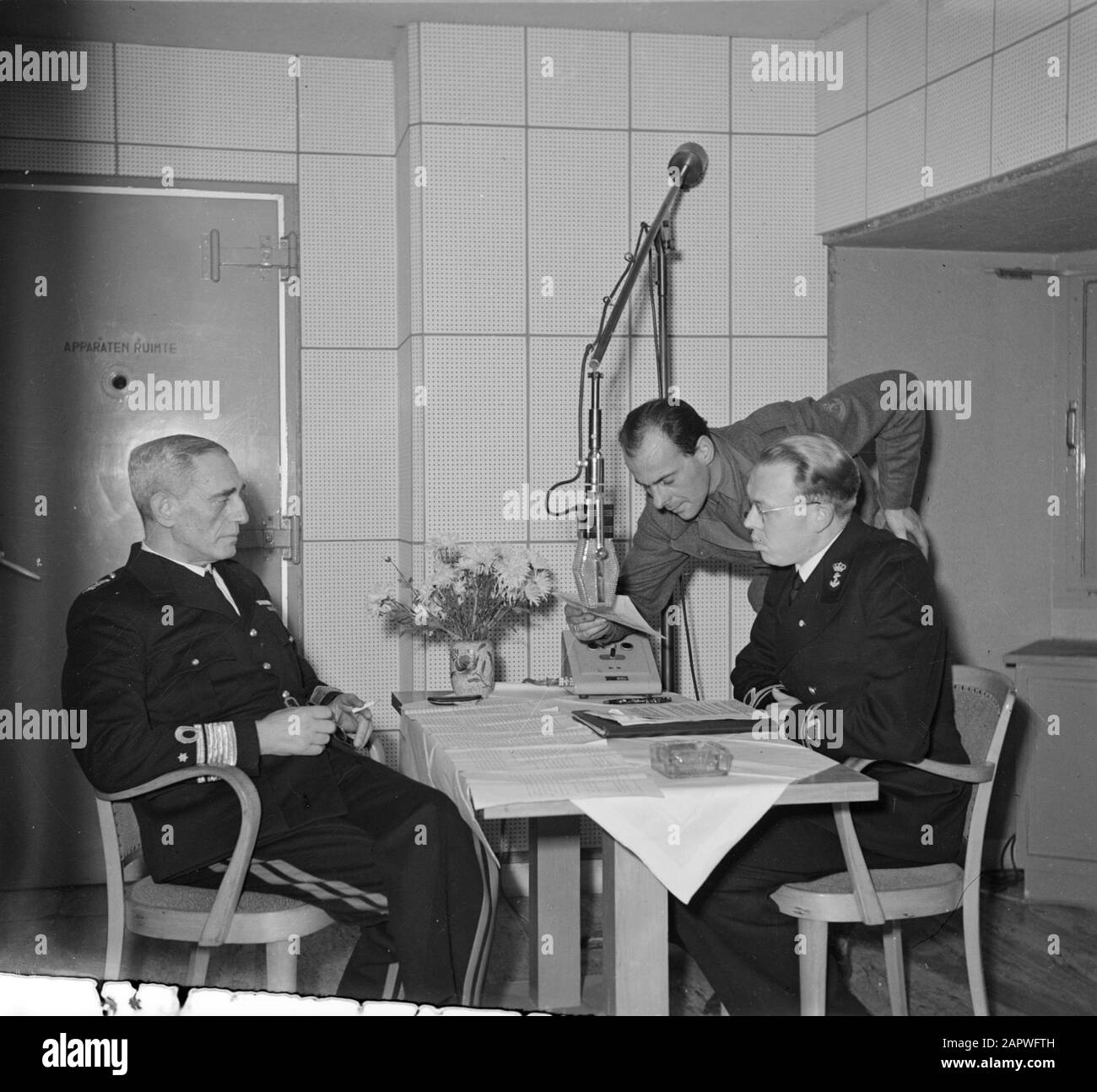 Navy officers during the preparation for a radio broadcast Date ...