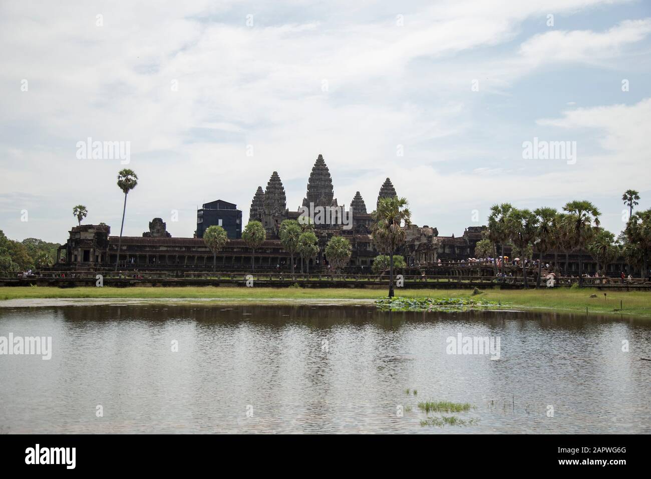 Iconic Angkor Wat building with lake during sunny day Stock Photo - Alamy