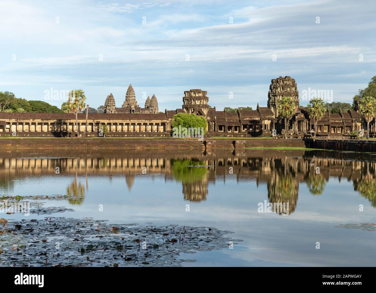 water reflection of exterior faÃ§ade of Angkor Wat during sunny day ...