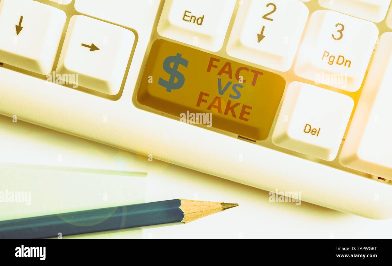 Handwriting text Fact Vs Fake. Conceptual photo Rivalry or products or ...