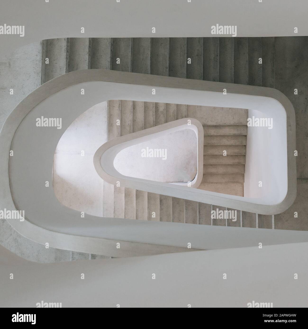 High angle view of a modern spiral staircase in an exhibition under the ...