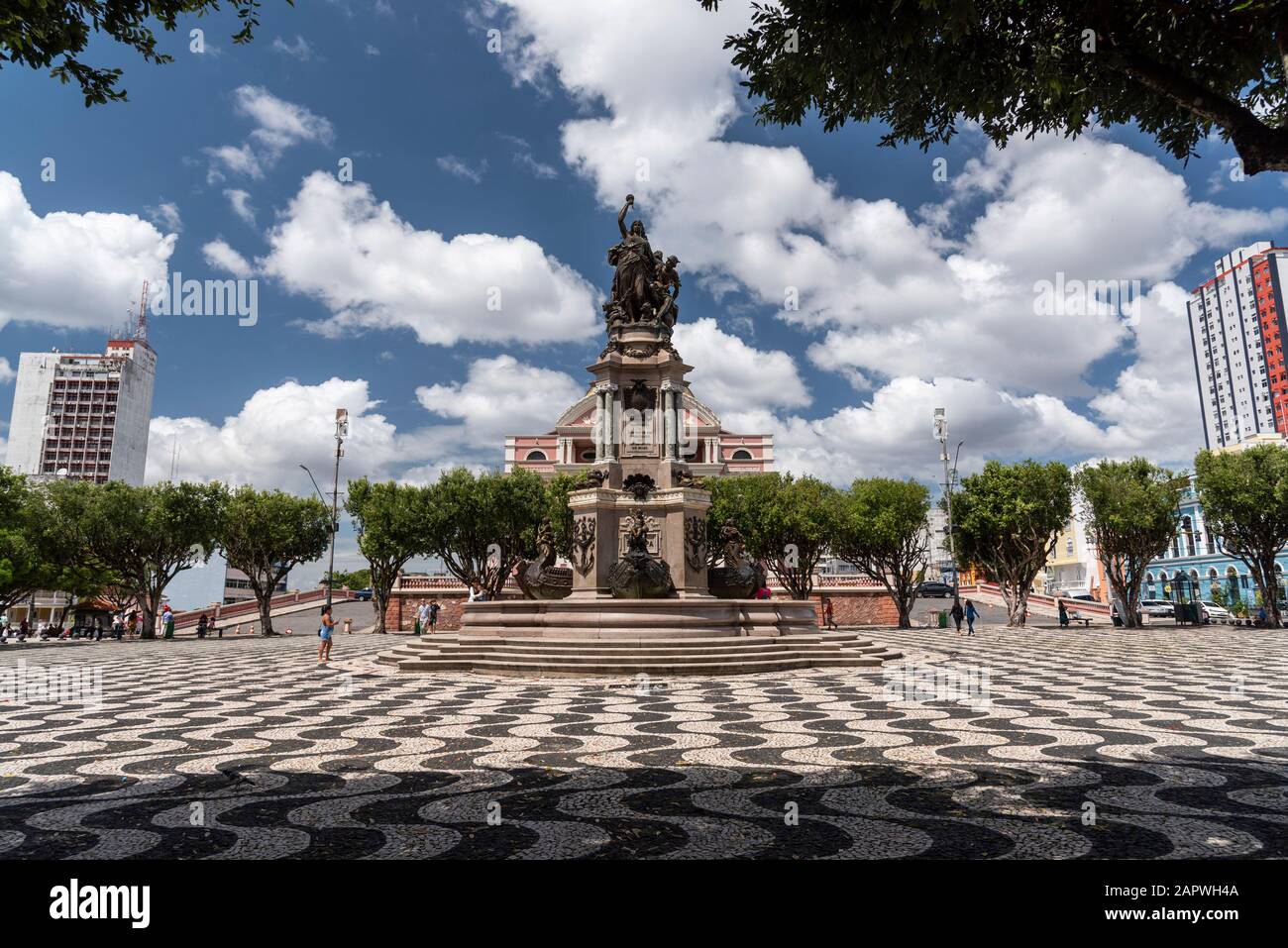 View to monument on public square and pink historic Teatro Amazonas ...