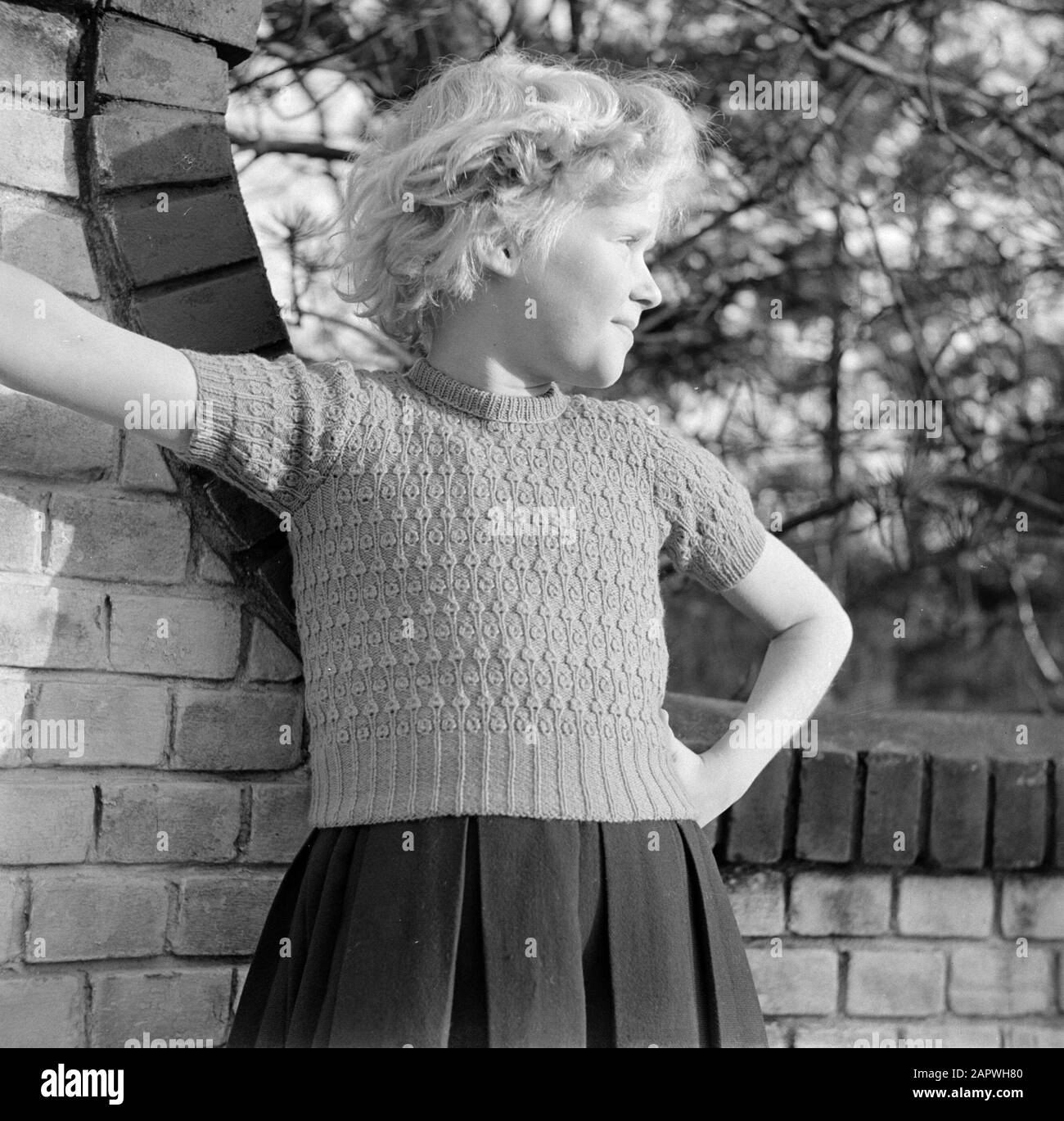 Fashion Photography Girl at wall Date: 1952 Keywords: clothing, girls ...