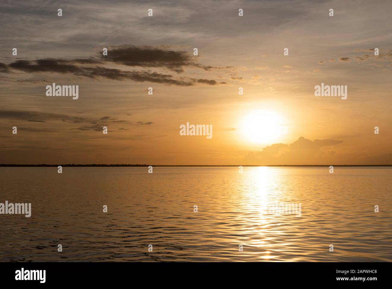 Beautiful Amazon sunset over the waters of Negro River with colorful ...
