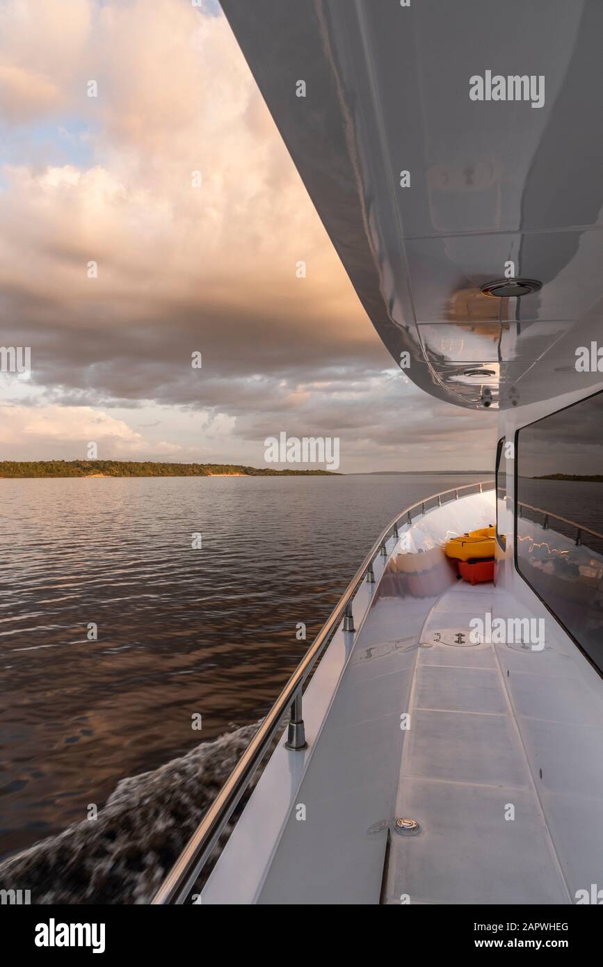 Beautiful Amazon sunset over the waters of Negro River with colorful ...