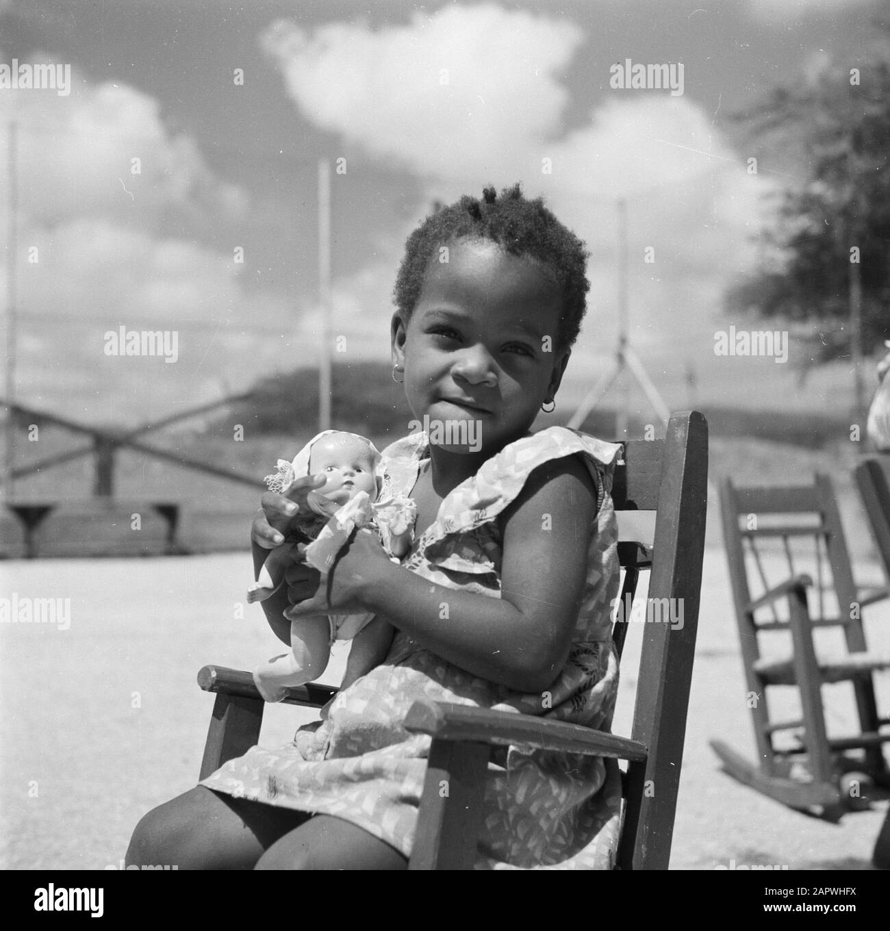 Travel to Suriname and the Netherlands Antilles Girl with doll in ...