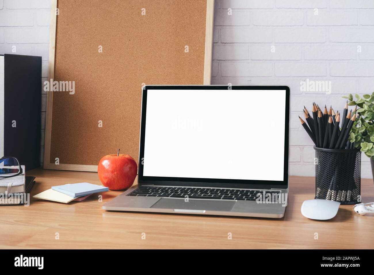 Mock up blank white screen laptop. Working space and white screen ...