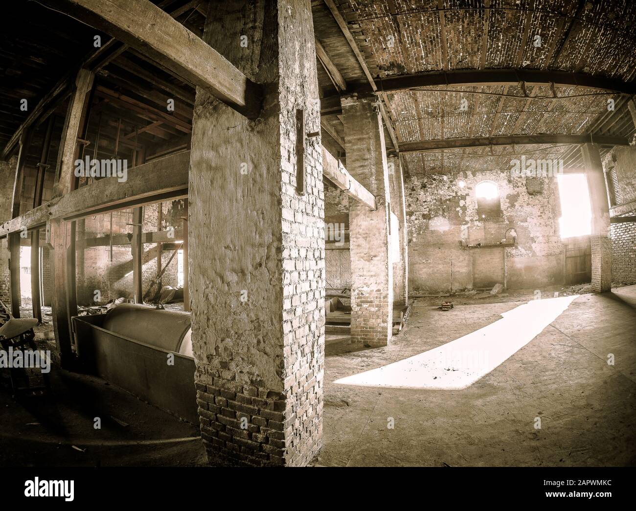 Inside of an old abandoned former industrial stone building Stock Photo ...