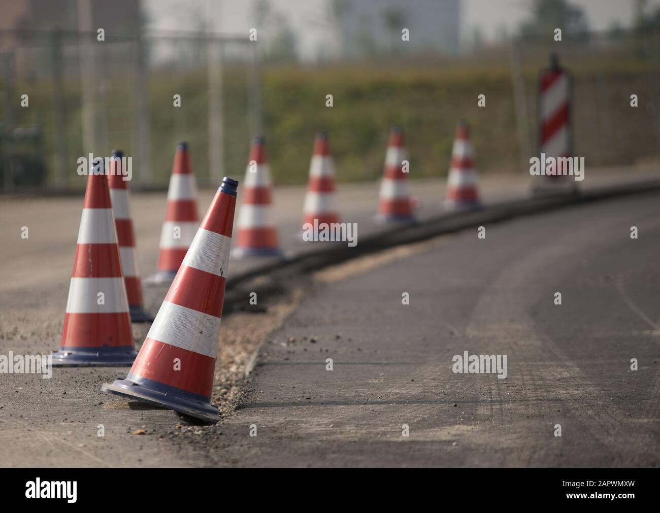 Red and white roadblocks next to each other during daytime Stock Photo ...