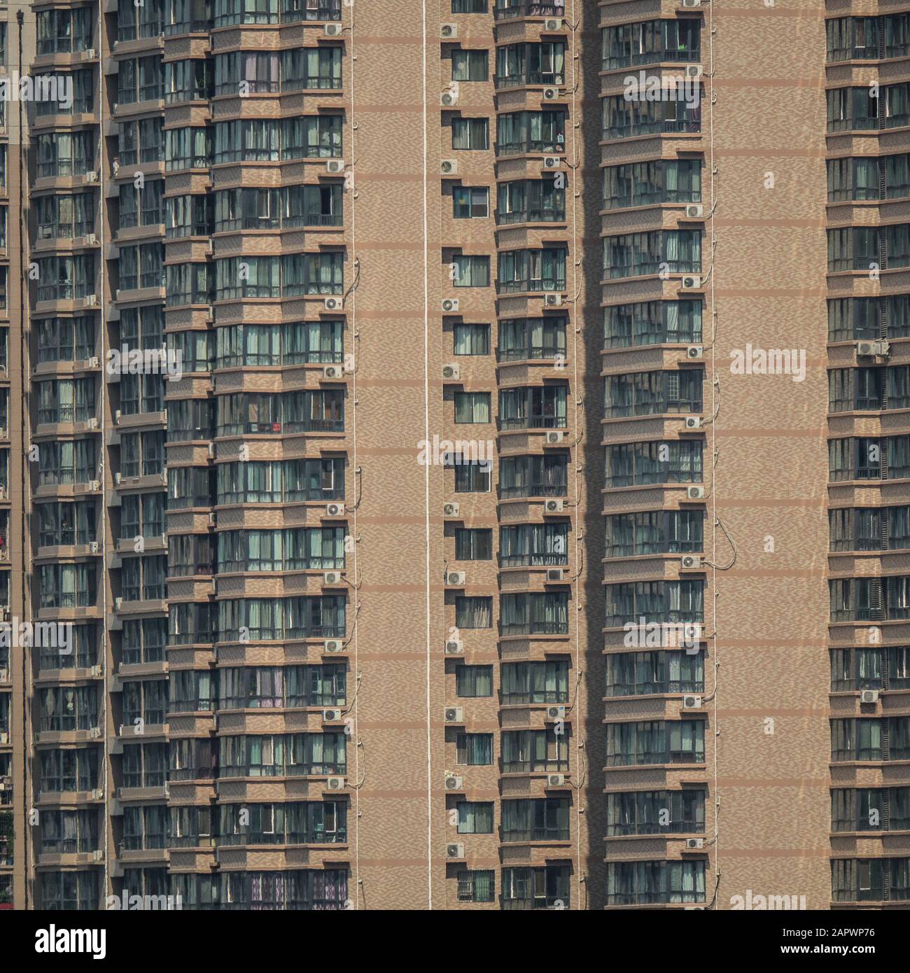 Closeup shot of a high residential building with multiple apartments ...
