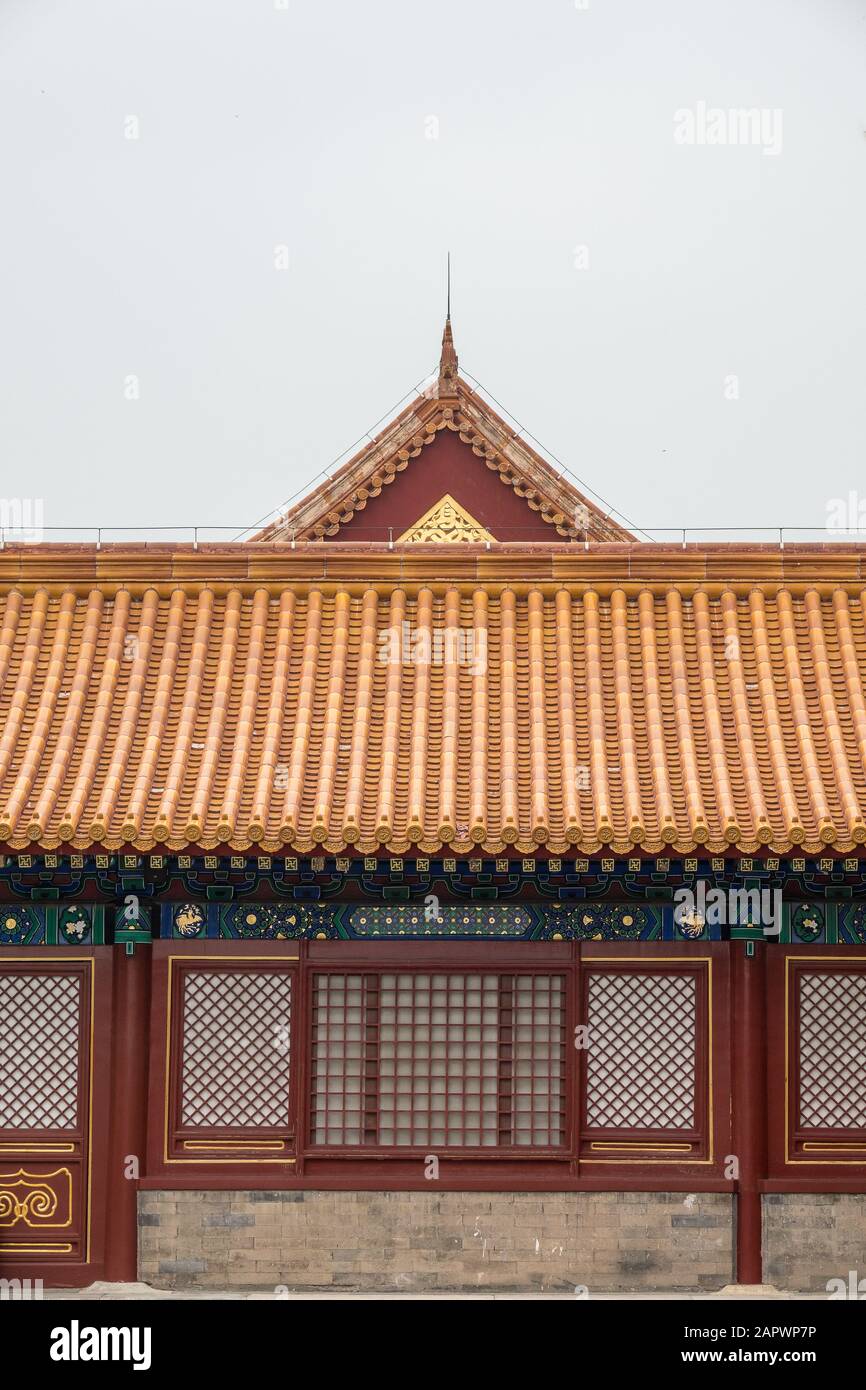 Vertical low angle shot of a historic building in China with a grey ...