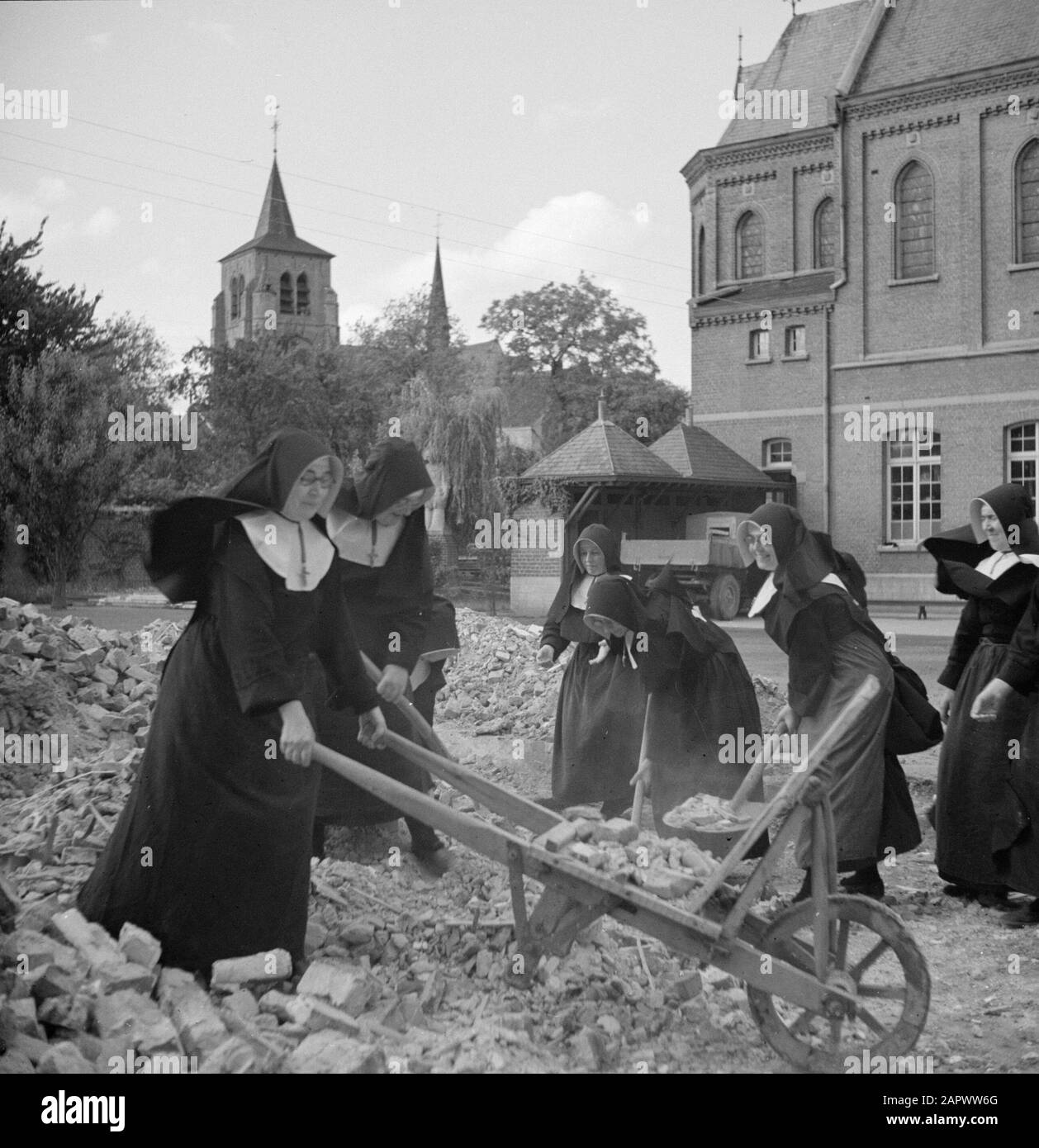 Rebuilding of a nuns Nuns dispose of construction waste with ...