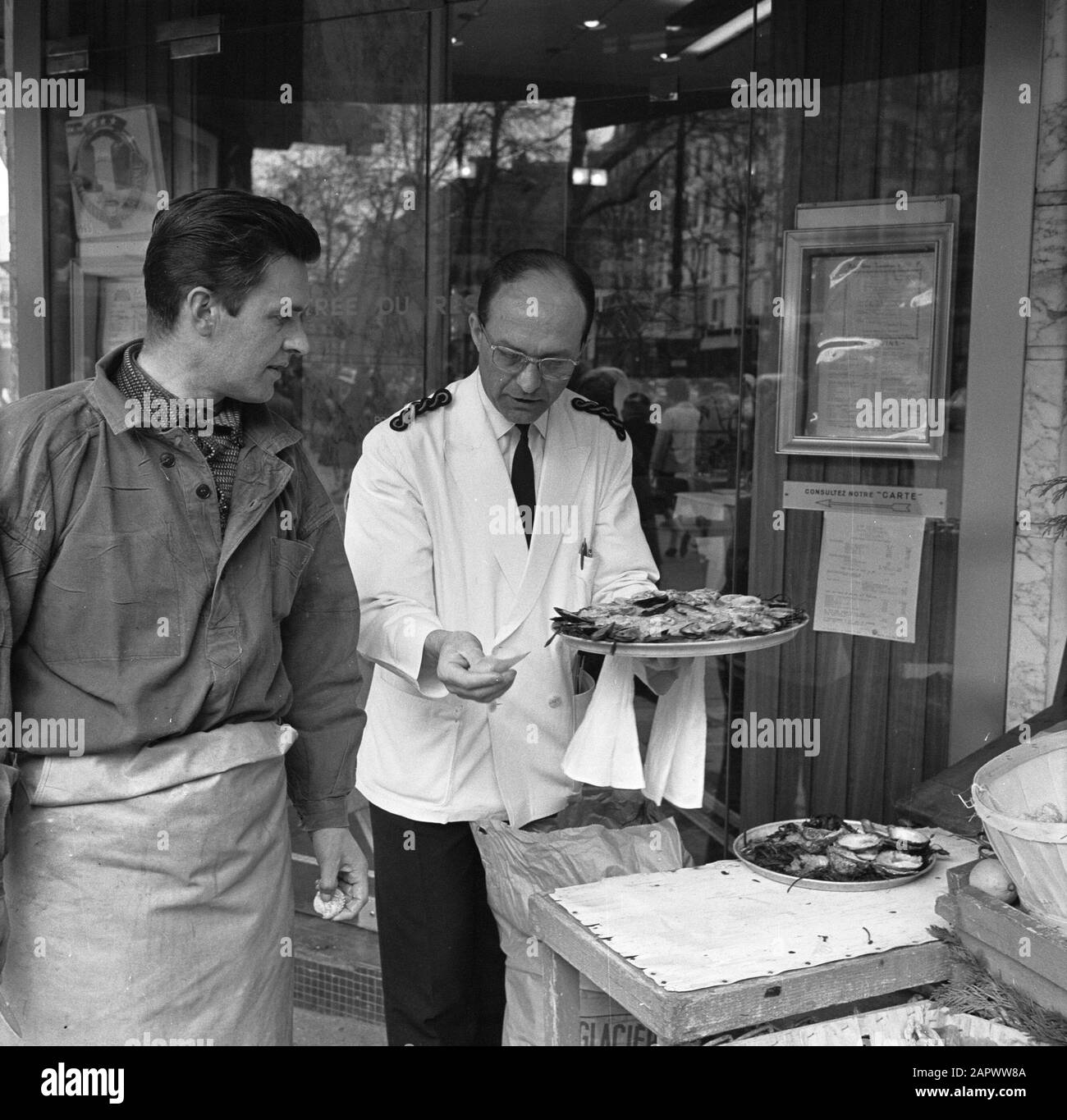 Parisian waiter tray Black and White Stock Photos & Images - Alamy