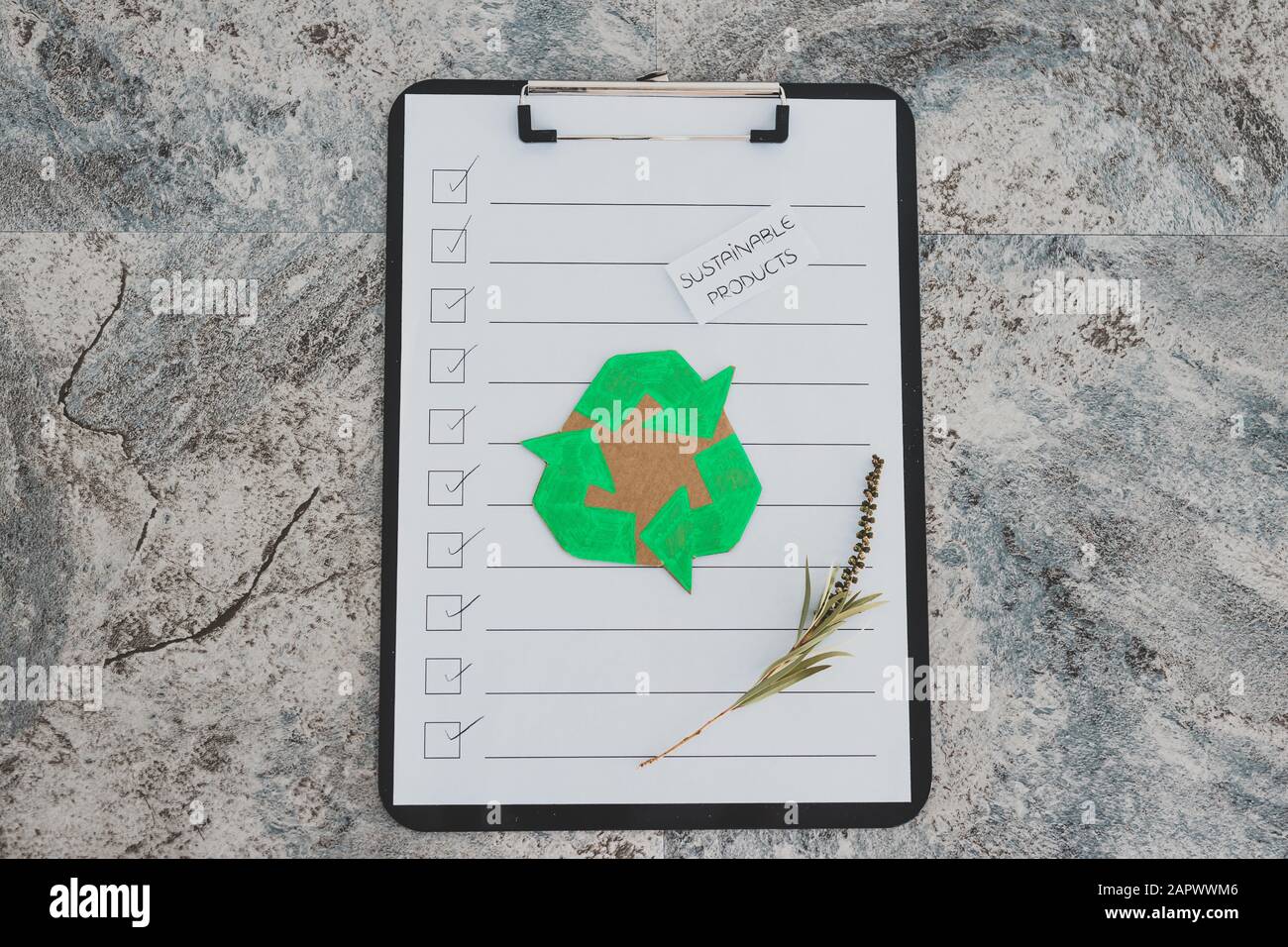 taking action for the environment conceptual still-life, clipboard with ...