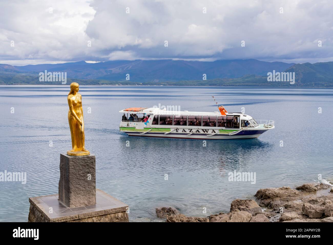 Akita, OCT 23: Statue of Tatsuko with ship in Lake Tazawako on OCT 23 ...