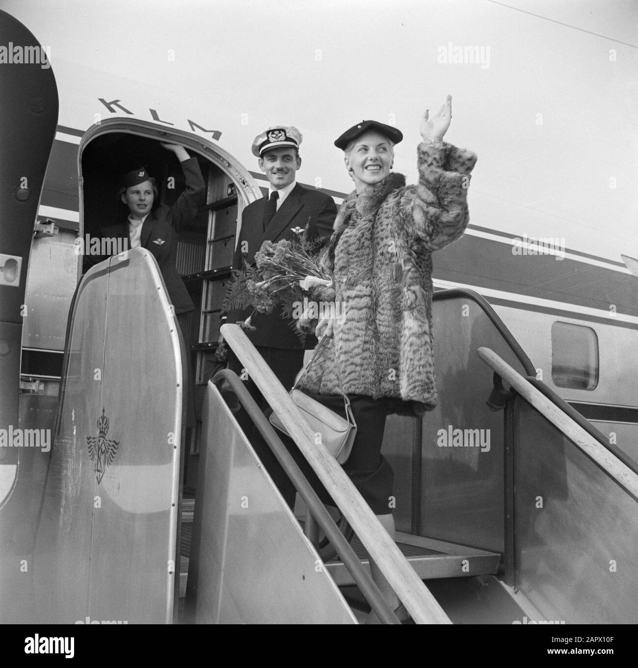 Advertising KLM Passengers board a KLM passenger plane by stairs where ...