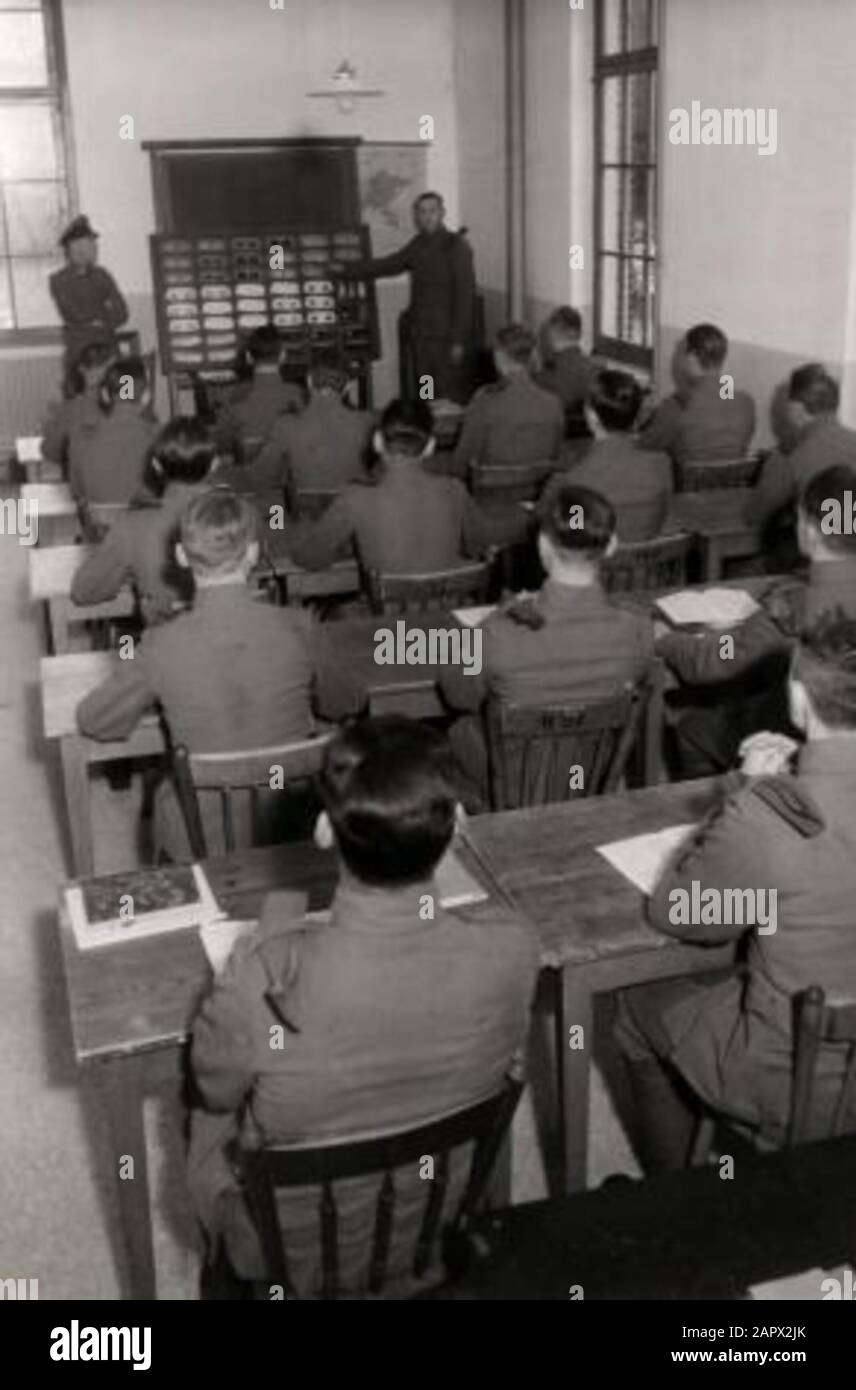 Dutch army, colonial troops, KNIL. Military in the school benches in a ...