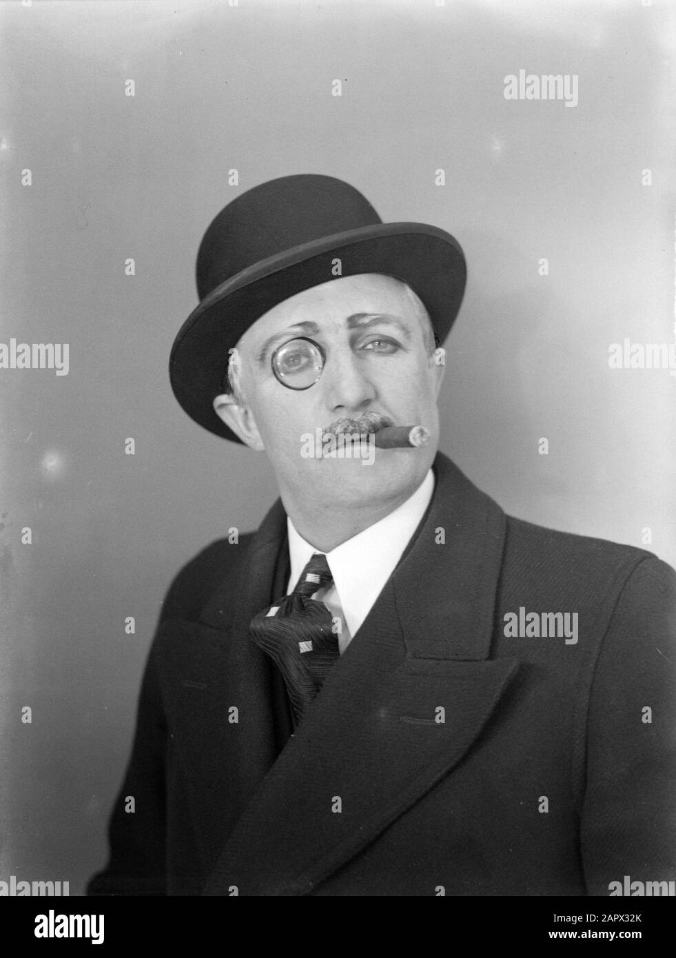 Portrait of a man with a monocle and a cigar Date: 1932 Keywords: hats ...
