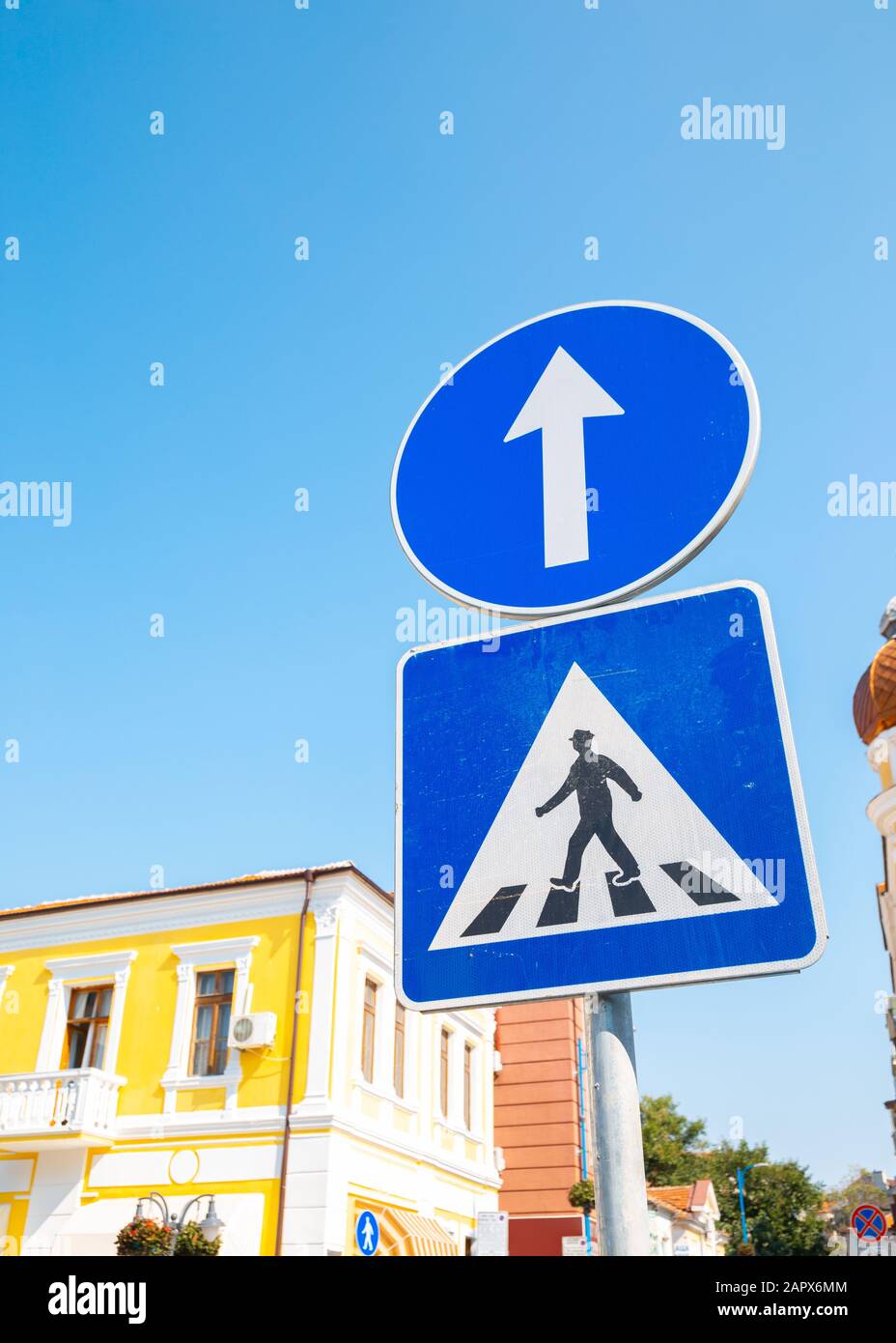 Traffic sign pedestrian crossing in European old town Stock Photo - Alamy