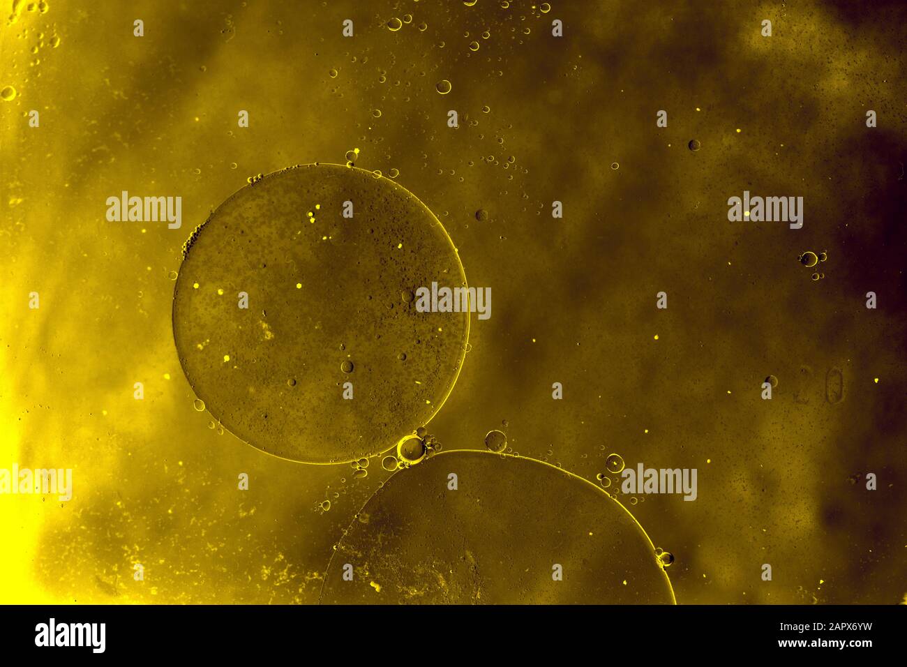 Oil bubbles inside water base form patterns Stock Photo - Alamy