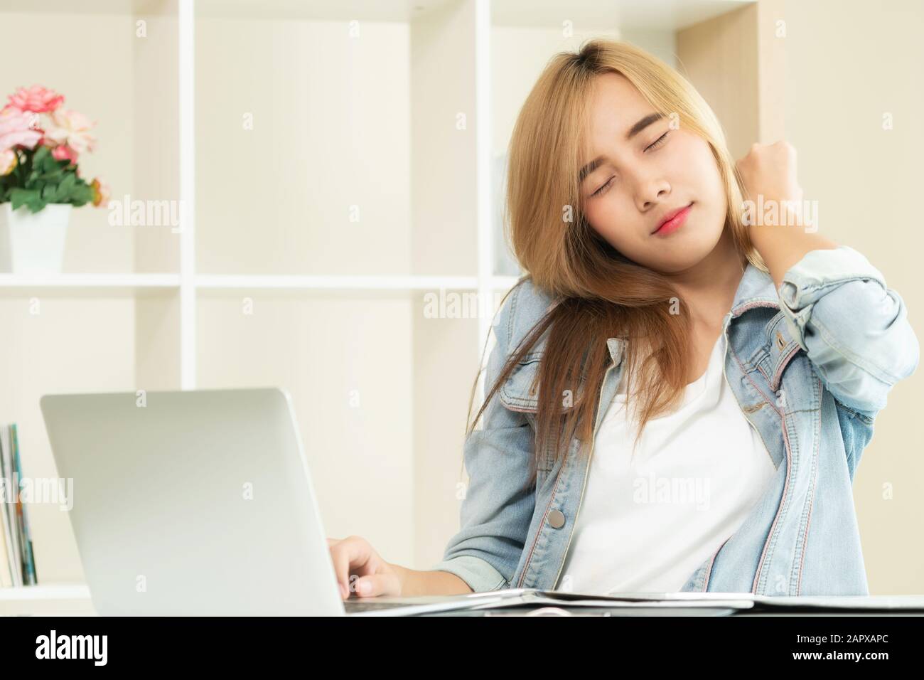 Woman with computer relieved hi-res stock photography and images - Alamy