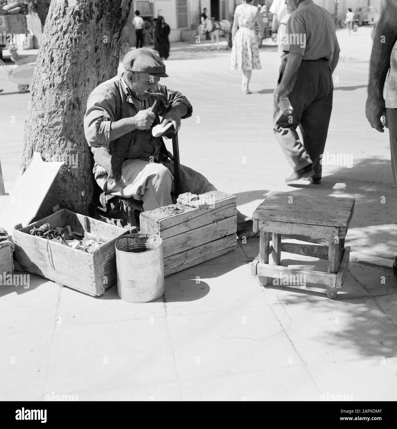 Shoemaker work in leather Black and White Stock Photos & Images - Alamy