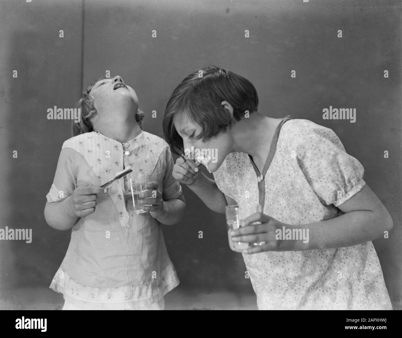 Family photos Stepdaughters Renée (left) and Hans brush their teeth ...