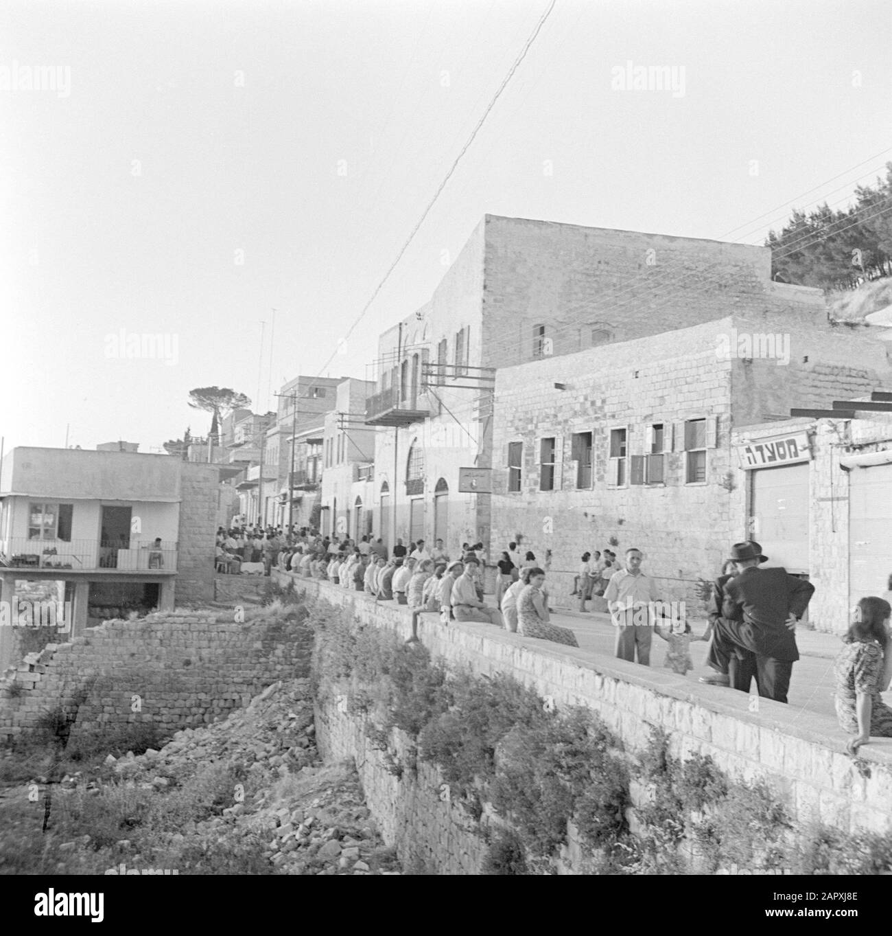 Israel 1948-1949: Safad (Safed) Street with walking and talking people ...