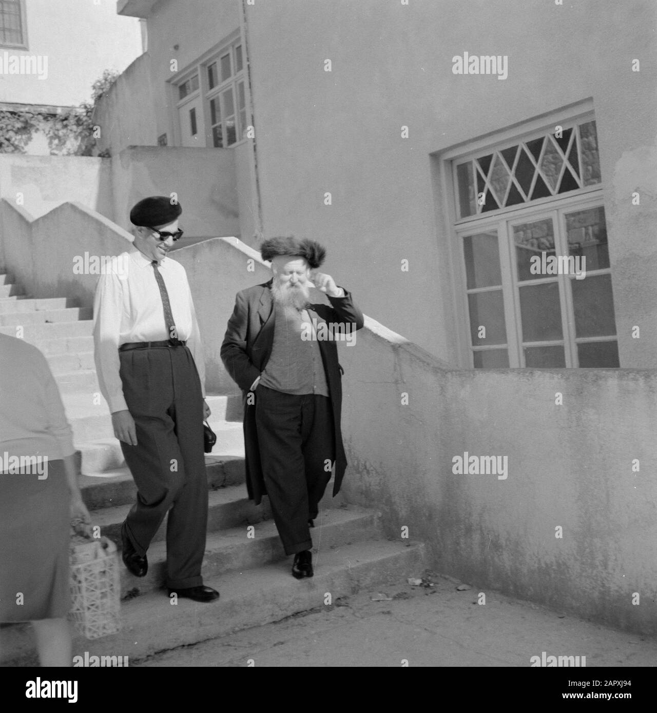 Street with stairs at Safad (Safed). Two men with headgear in ...