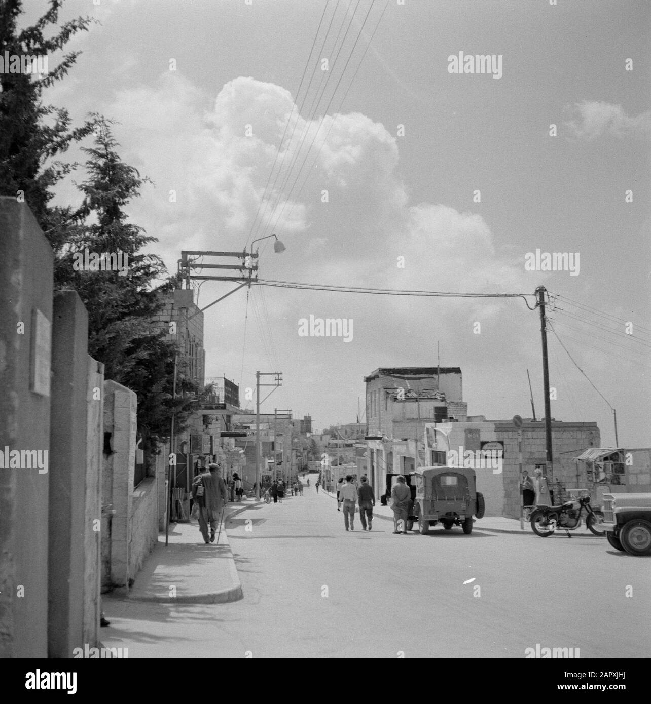 Streetscape in Safad (Safed) with traffic and telephone poles Date ...