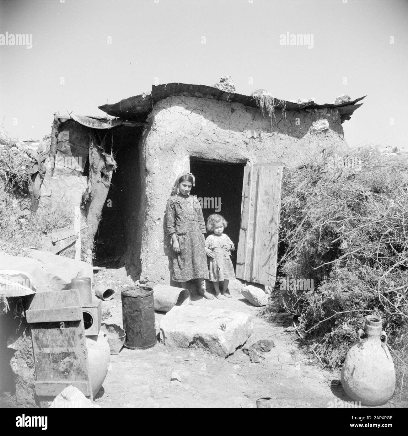 Middle East 1950-1955: Jordan Two girls for their shelter in the ...