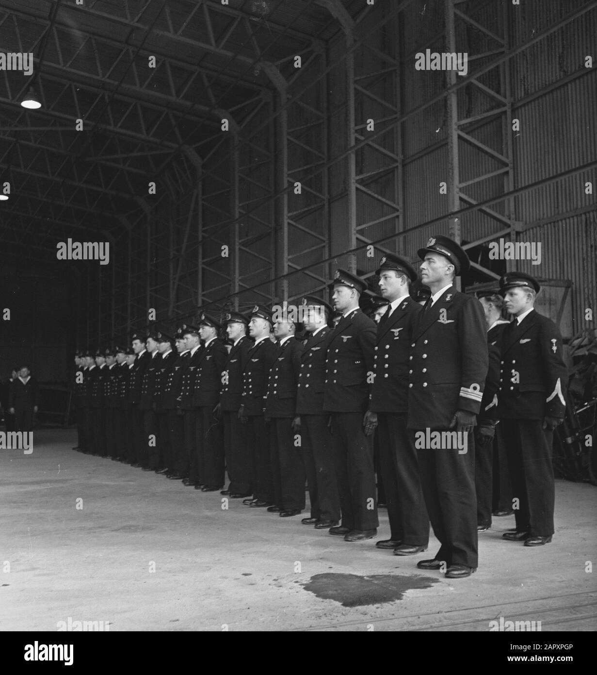 Two Dutch pilots of a Mitchell bomber squadron receive the ...