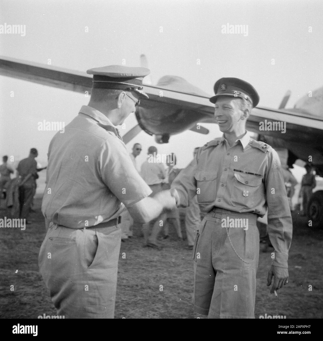War volunteers in Malacca and Indonesia Two soldiers at an airport in ...