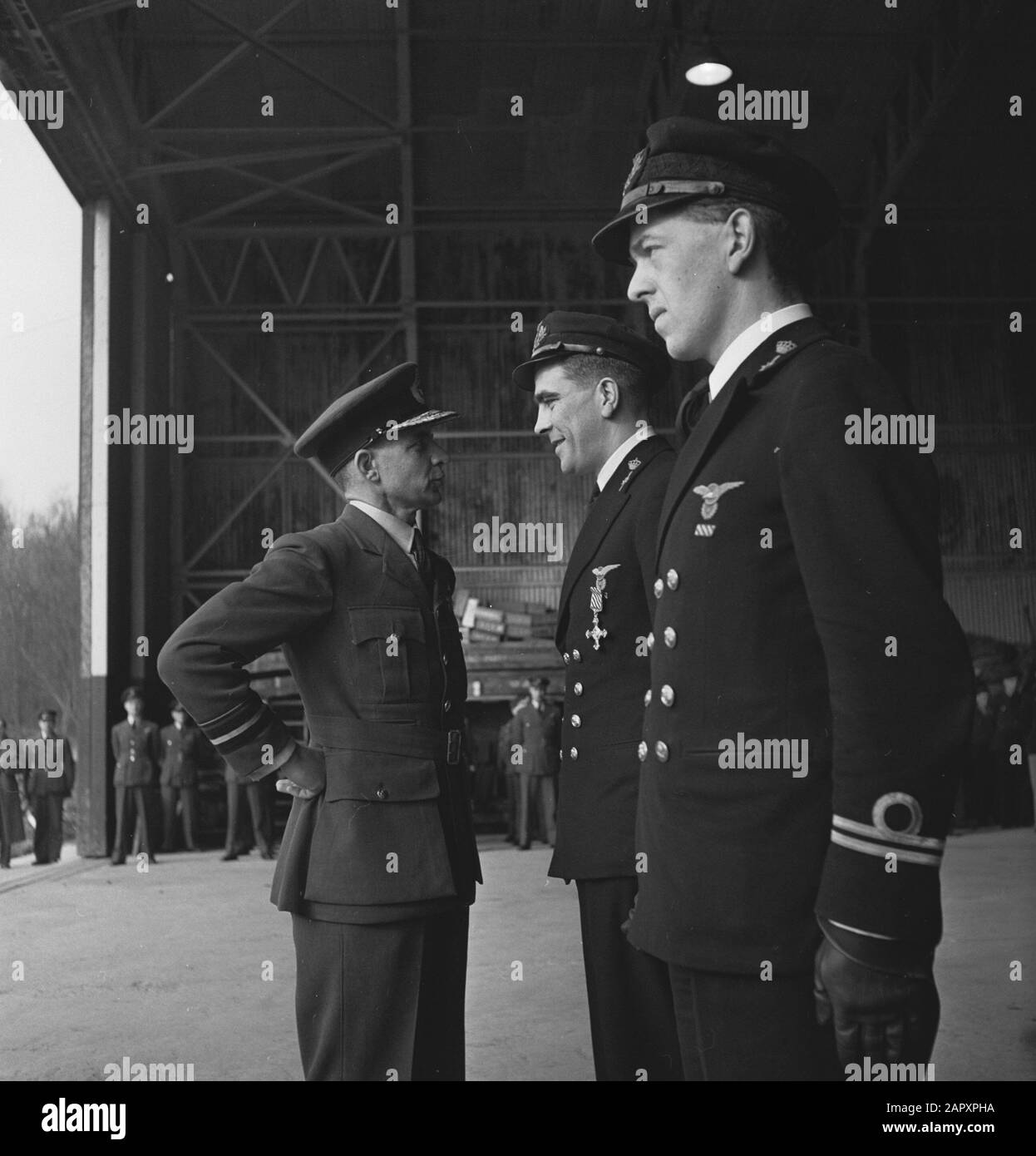 Two Dutch pilots of a Mitchell bomber squadron receive the ...