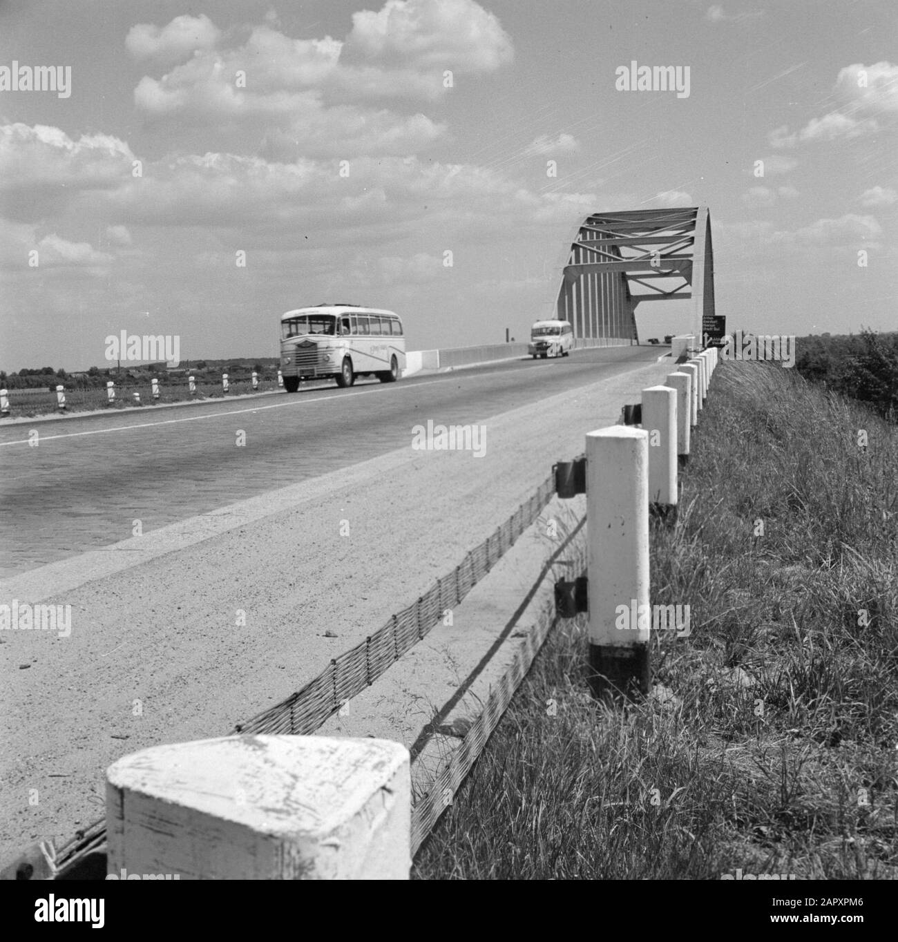 Traffic roads and bridges in the Netherlands Two school buses on the ...