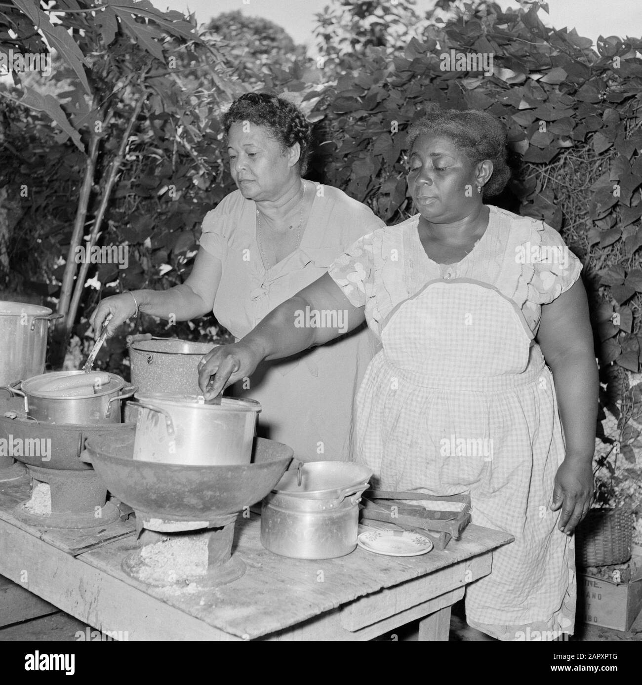 Caribbean food cooking Black and White Stock Photos & Images - Alamy
