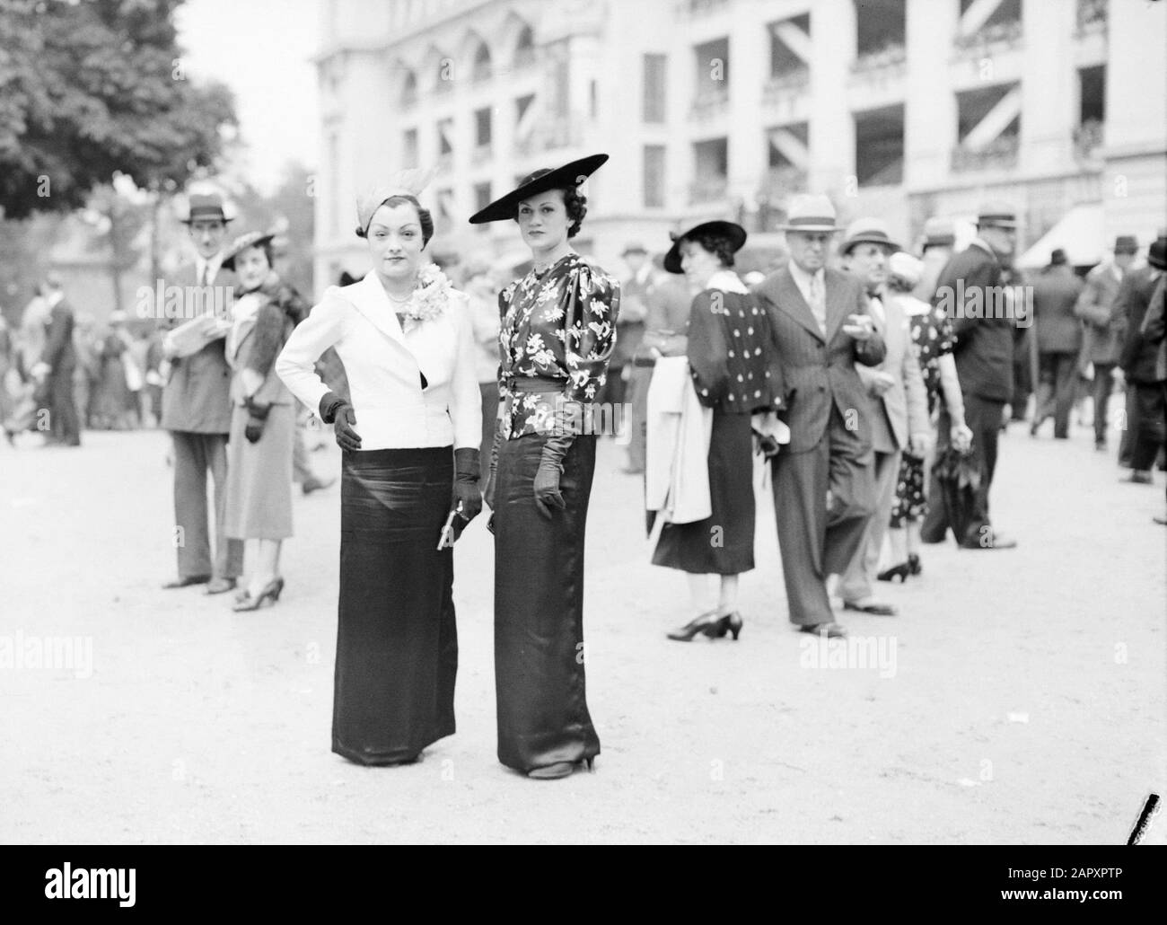 Two women with long dresses Black and White Stock Photos & Images - Alamy