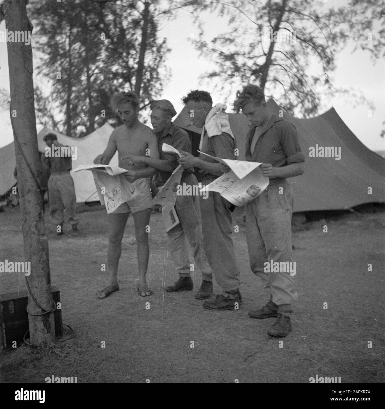 War Volunteers in Malacca and Indonesia handing out the Pen & Gun in a ...