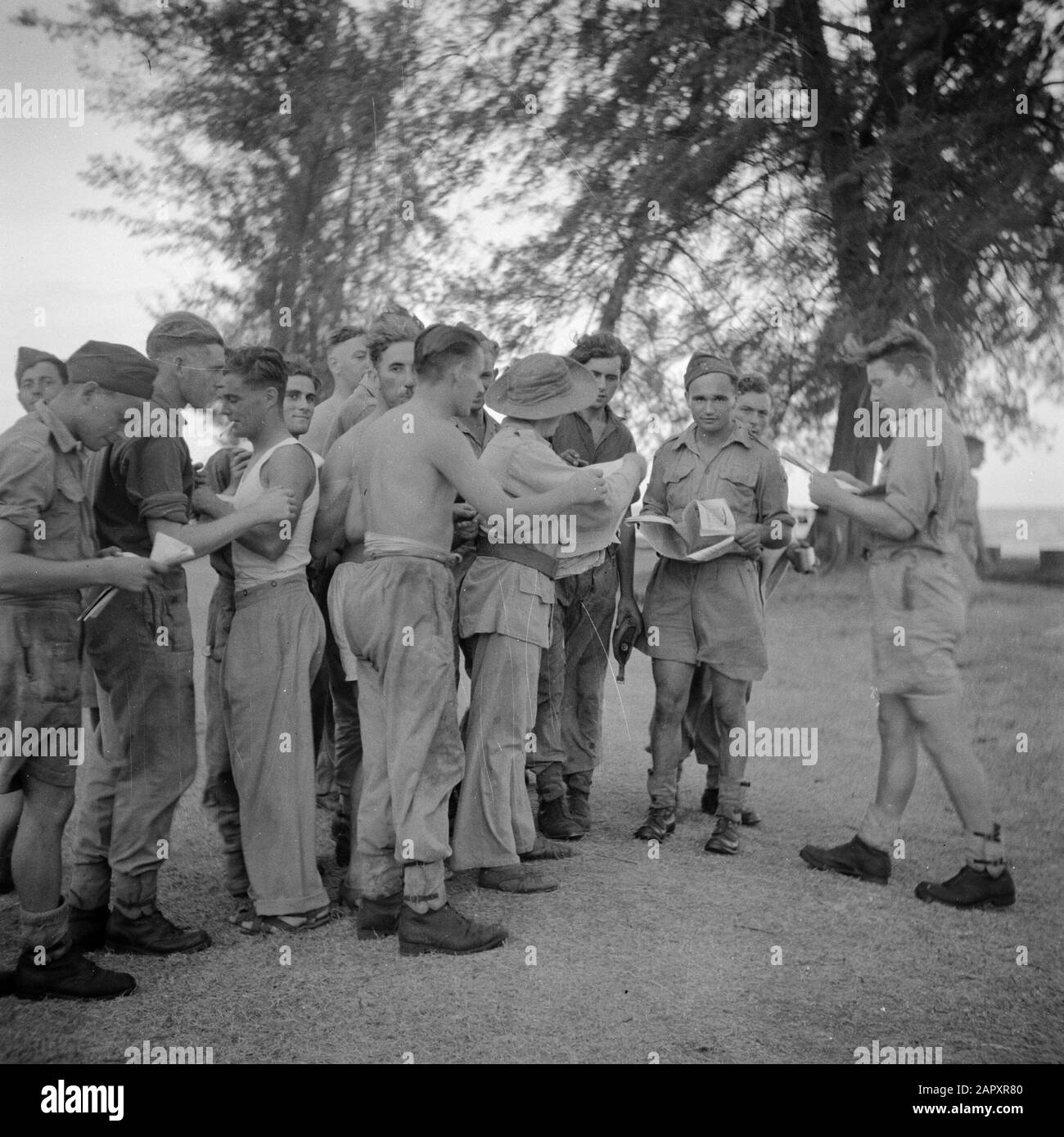 War Volunteers in Malacca and Indonesia handing out the Pen & Gun in a ...