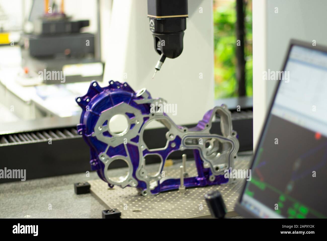Blurred picture of aluminum machined parts inspected dimension by CMM ...