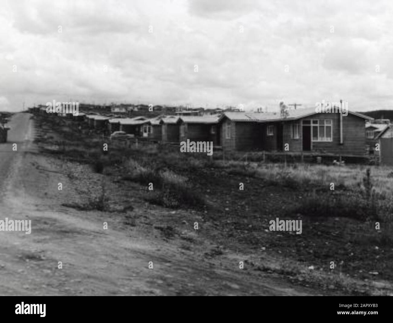 Prefab homes in Coomka, New Zealand, 1954, the primitive conditions in ...