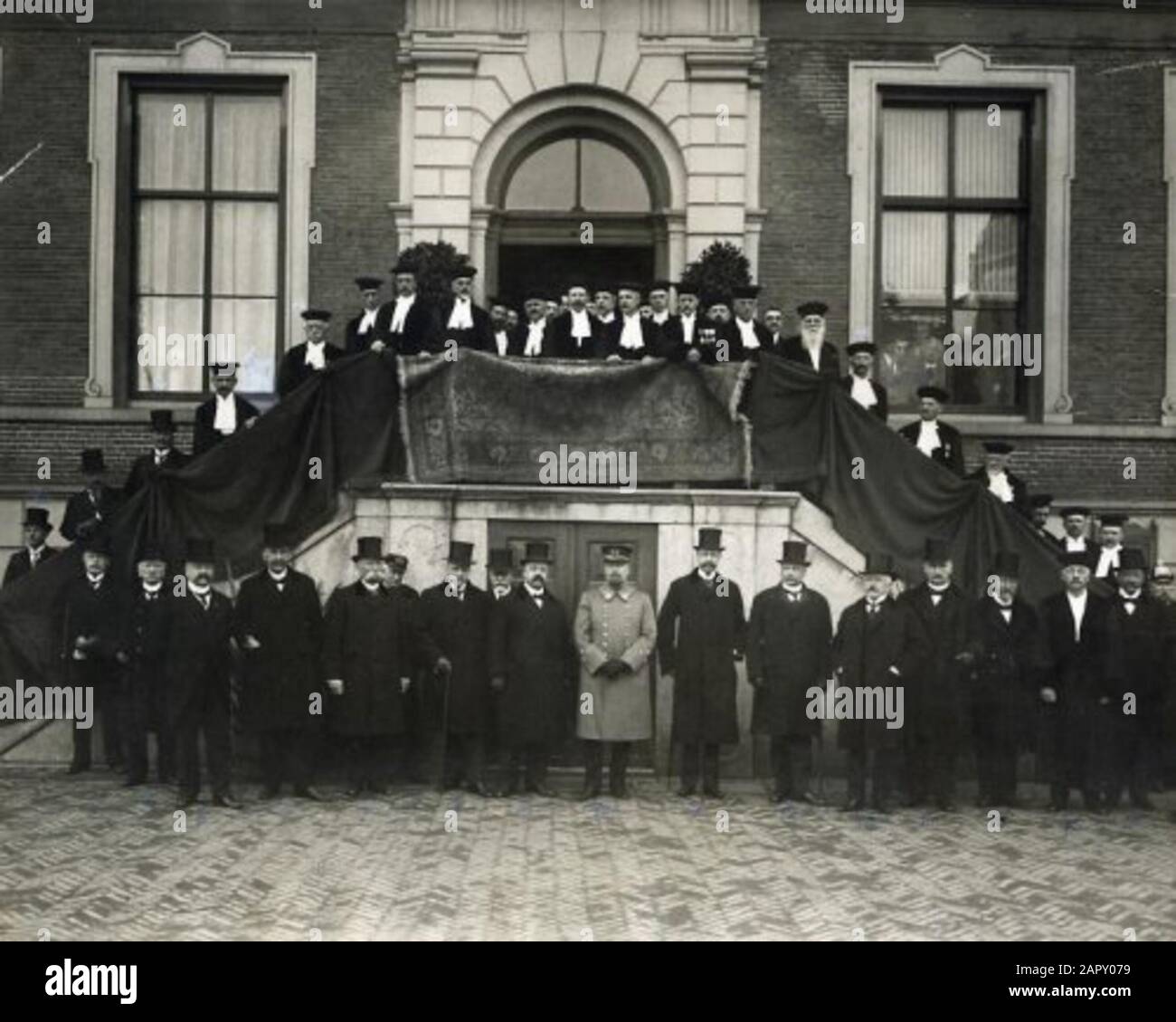 Colleges. Professors/lecturers are in toga on the stairs, at the ...