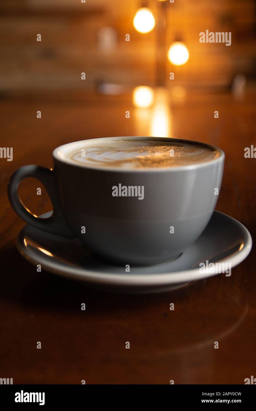 Single Coffee mug with spiraling creamer. Side/Front view Stock Photo ...