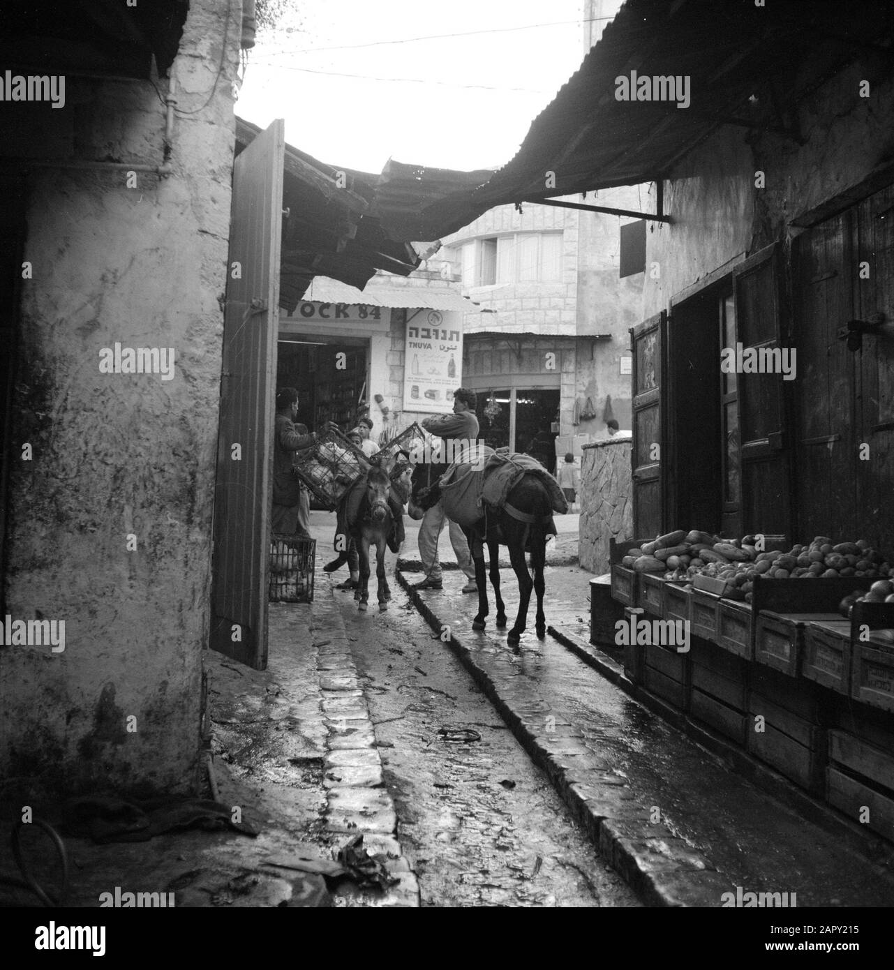 Israel: Nazareth Shopping street with displayed goods and loaded ...